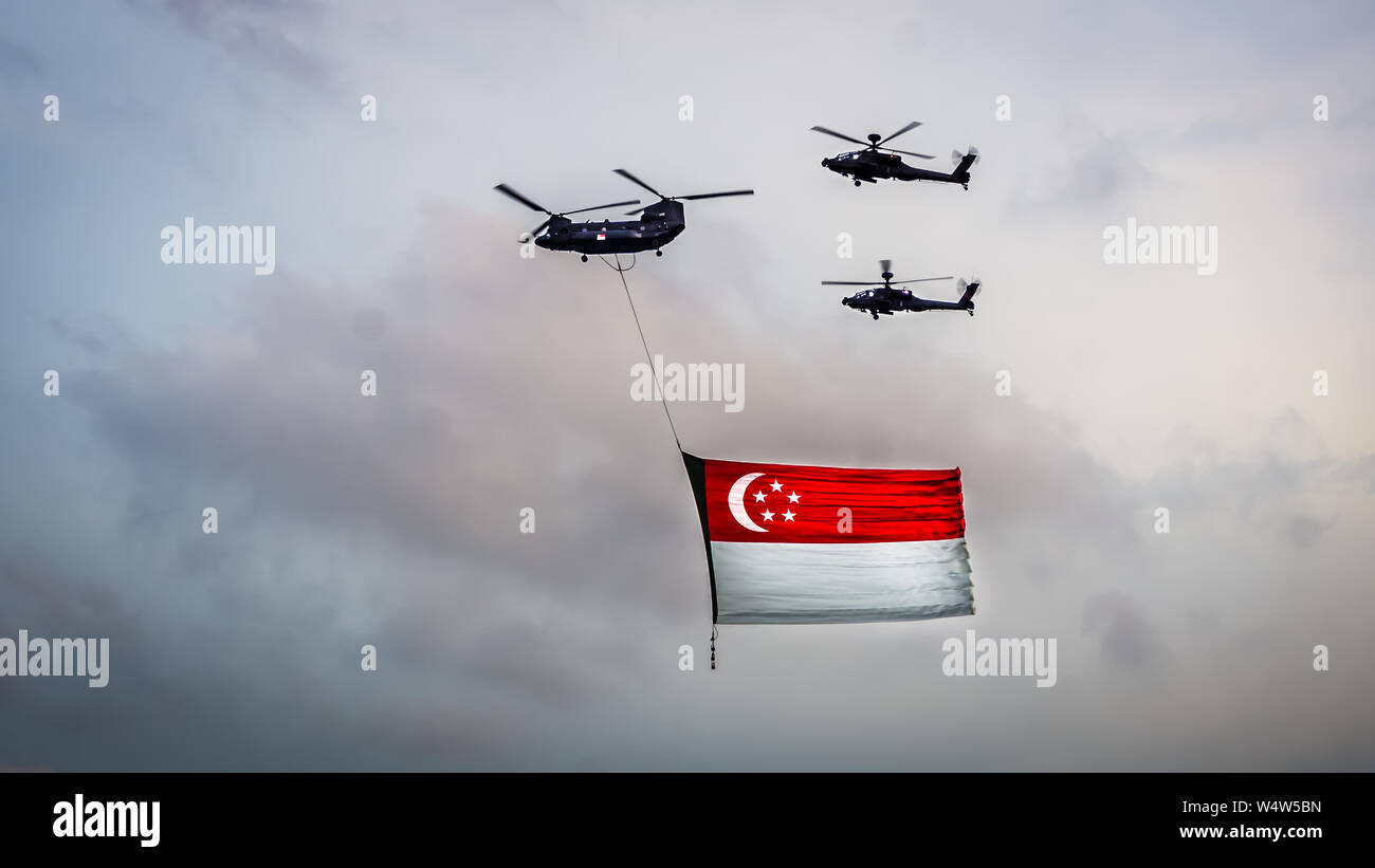 Singapore national day helicopters flag hi-res stock photography and ...
