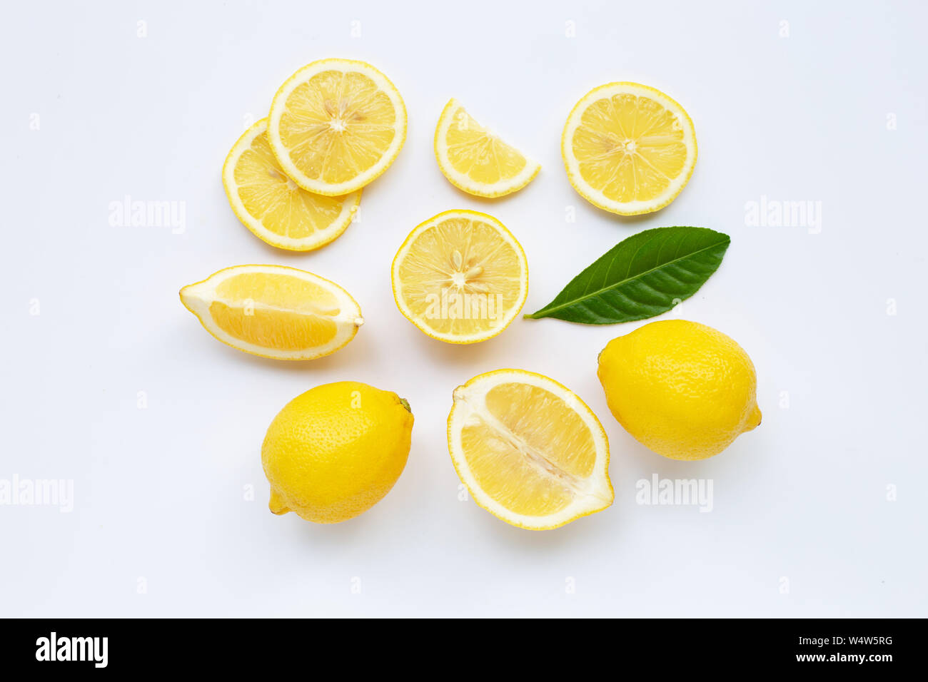 lemon and slices with leaves isolated on white background Stock Photo ...