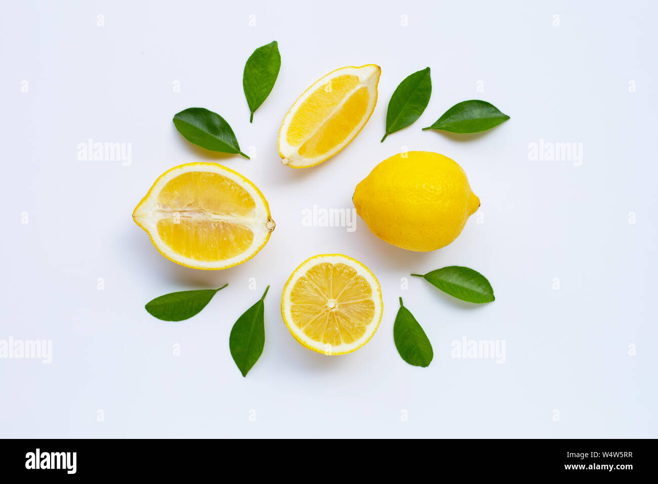 lemon and slices with leaves isolated on white background Stock Photo ...