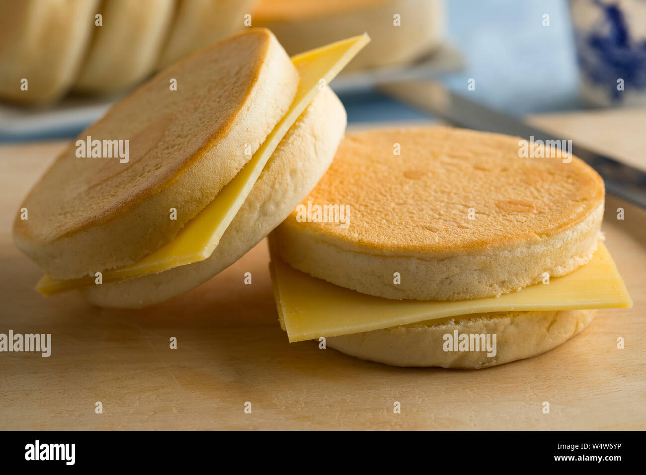 Dutch beschuitbollen, crispy baked roll, with cheese for lunch Stock ...