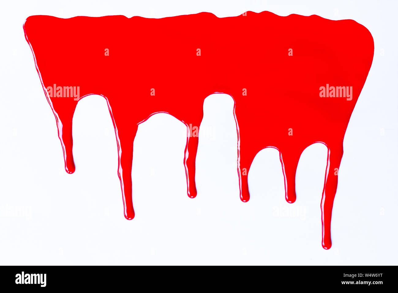 Red paint dripping on a white background Stock Photo - Alamy