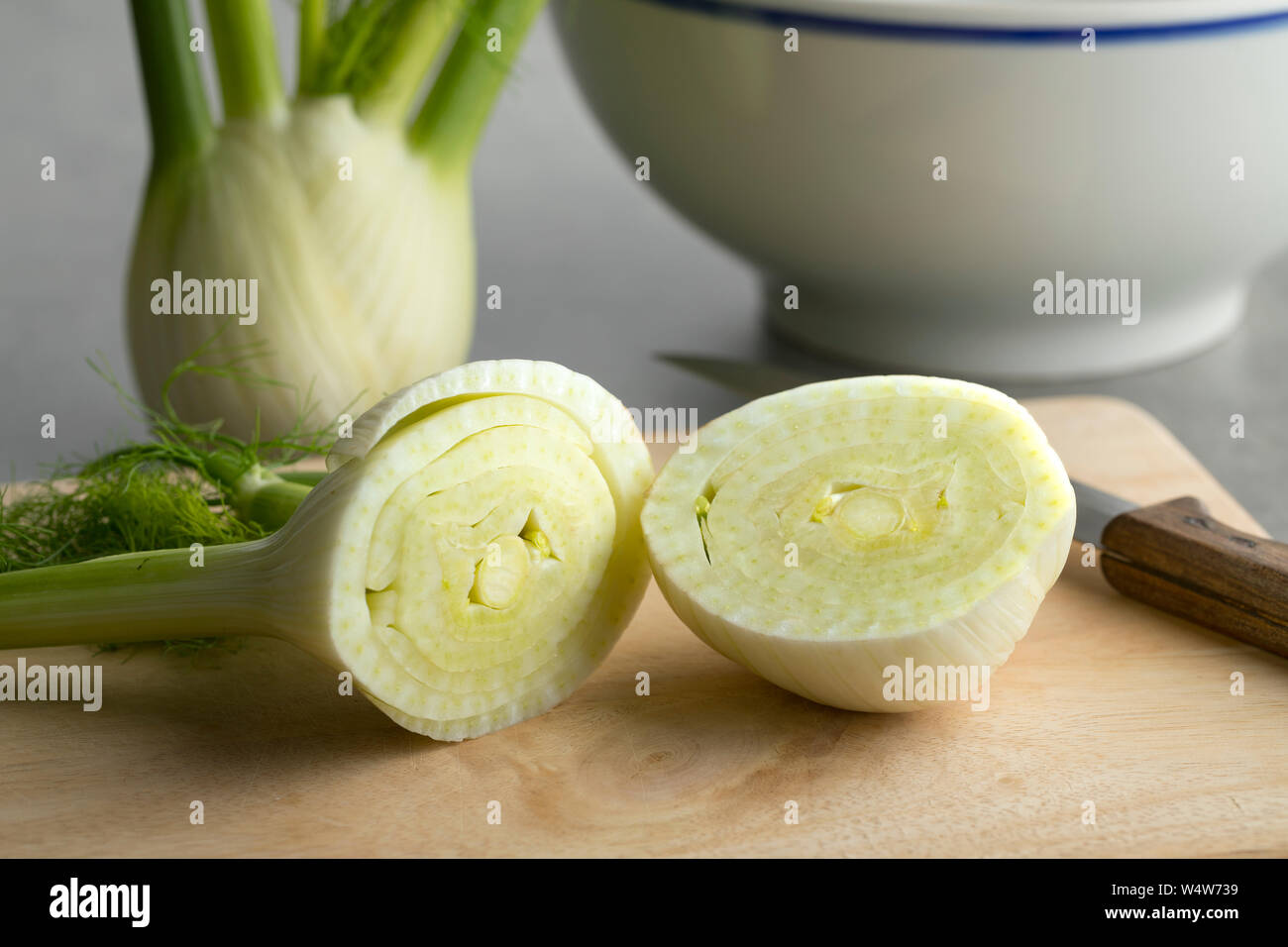 Fresh raw organic fennel bulb halved in two parts Stock Photo - Alamy