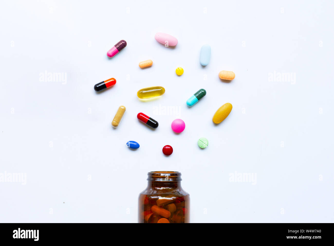 Colorful tablets with capsules and pills on white background Stock ...