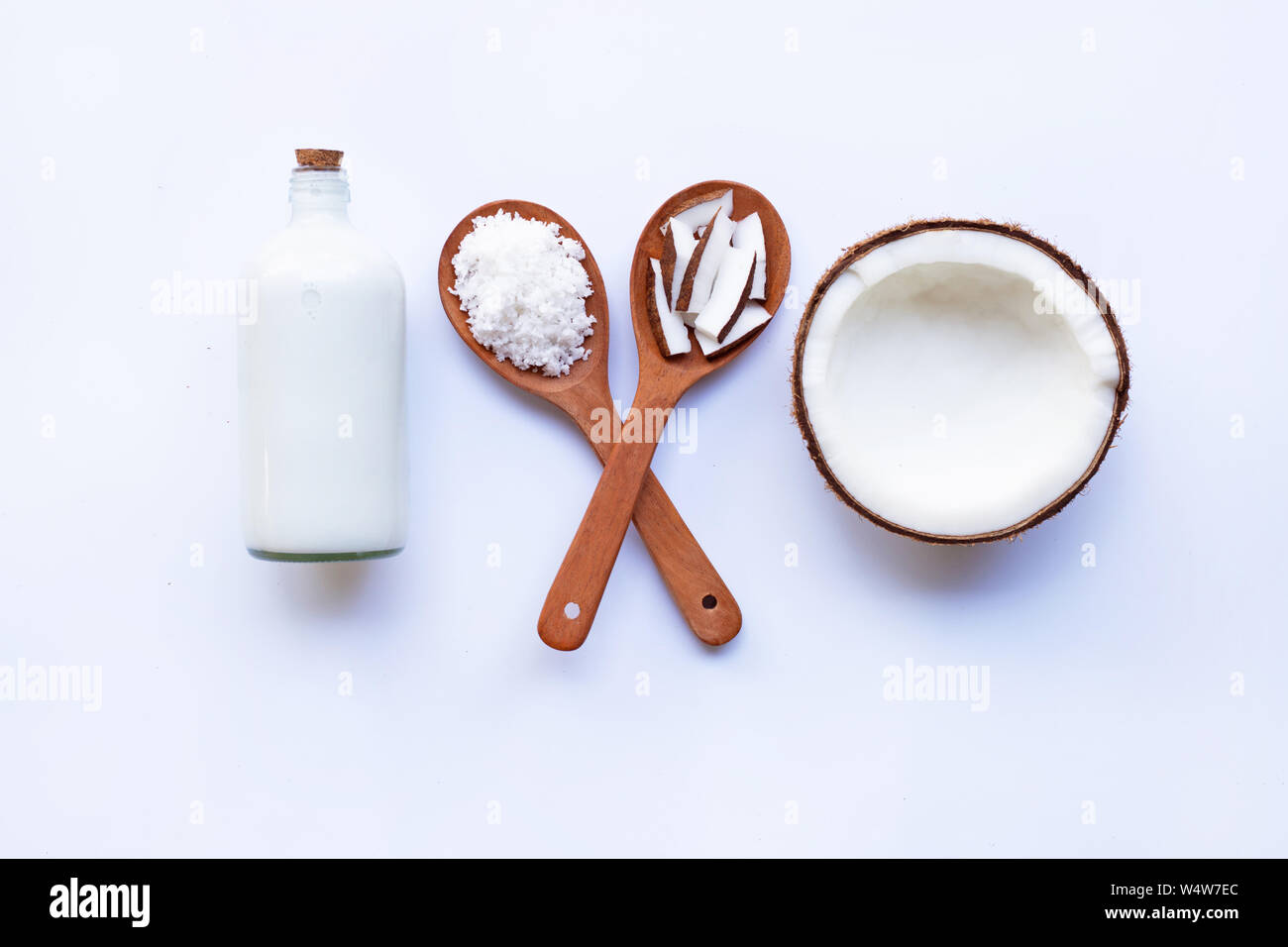 Coconut with coconut milk on white background Stock Photo - Alamy