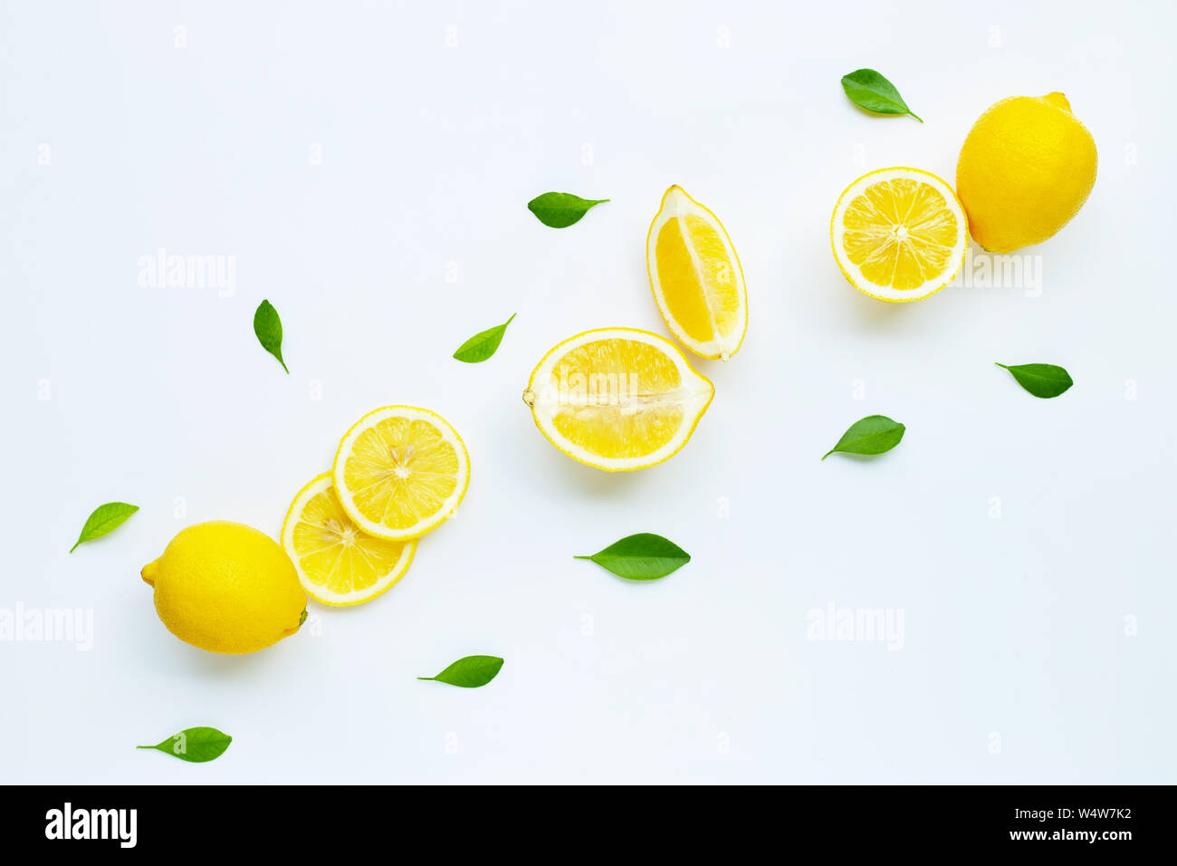 lemon and slices with leaves isolated on white background Stock Photo ...