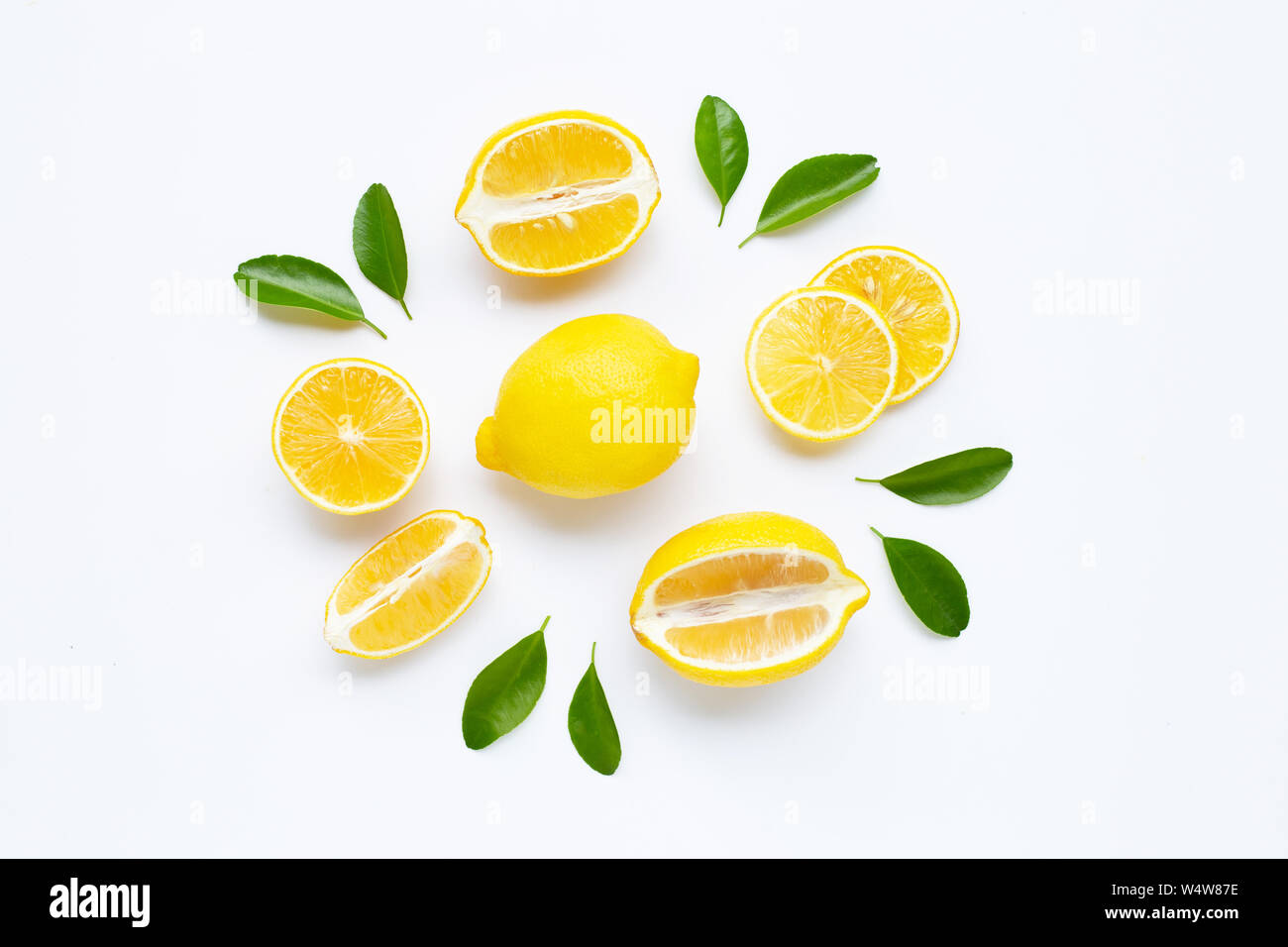 lemon and slices with leaves isolated on white background Stock Photo ...