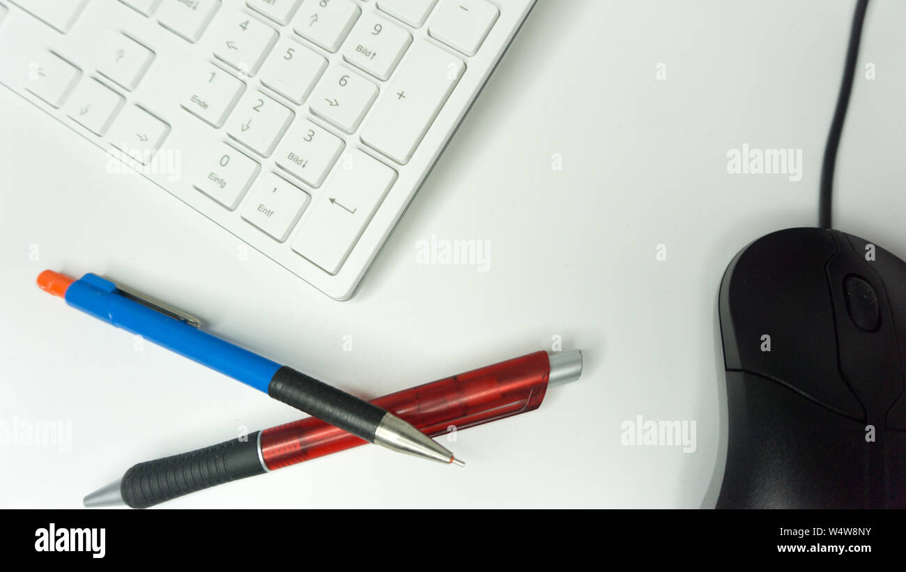 mouse keyboard and pens Stock Photo - Alamy