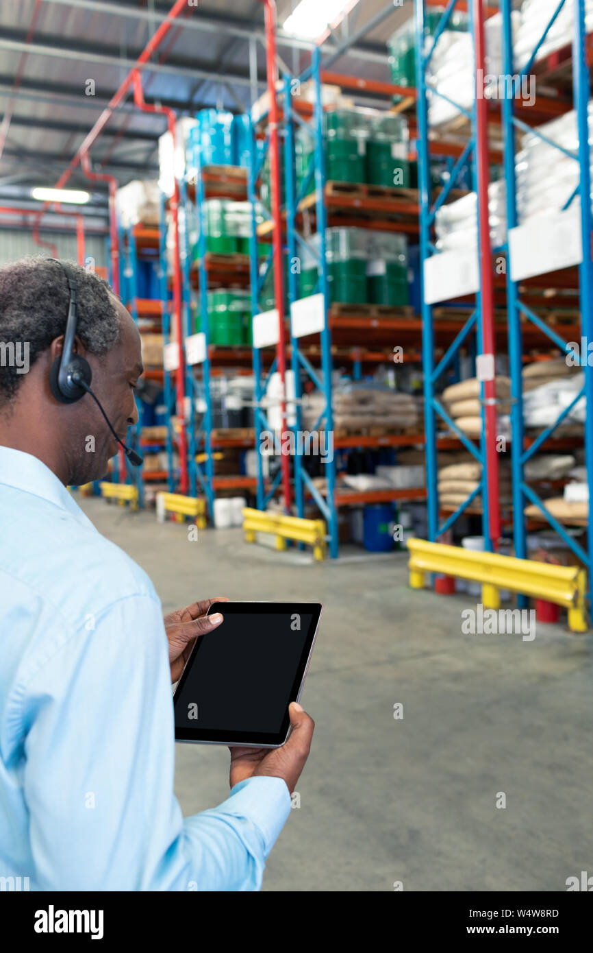 Male supervisor using digital hi-res stock photography and images - Alamy