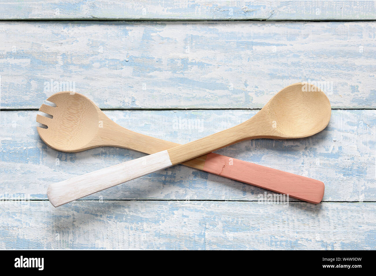 Wooden Spoon and Fork on Textured Background Stock Photo - Alamy