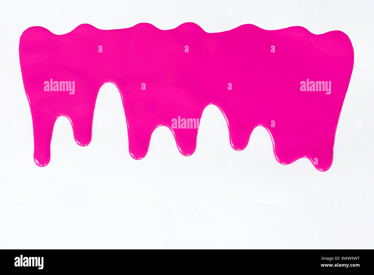 Pink paint dripping on a white background Stock Photo - Alamy
