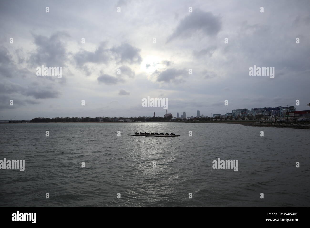 Raft in Ocean Sun Above Stock Photo - Alamy