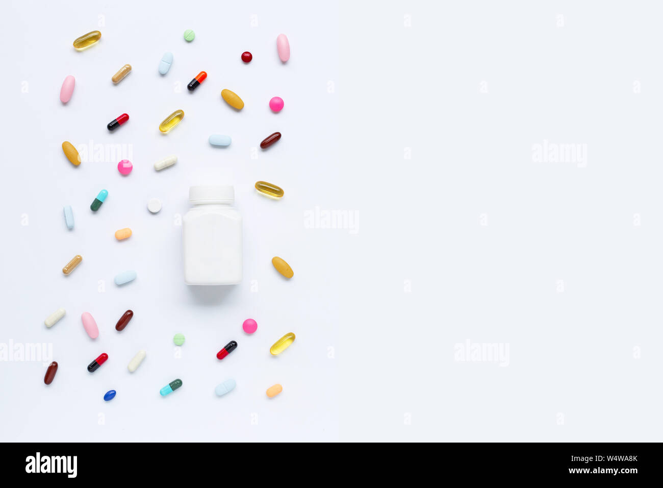 Colorful tablets with capsules and pills on white background Stock ...