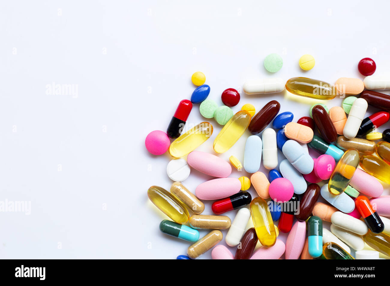 Colorful tablets with capsules and pills on white background Stock ...