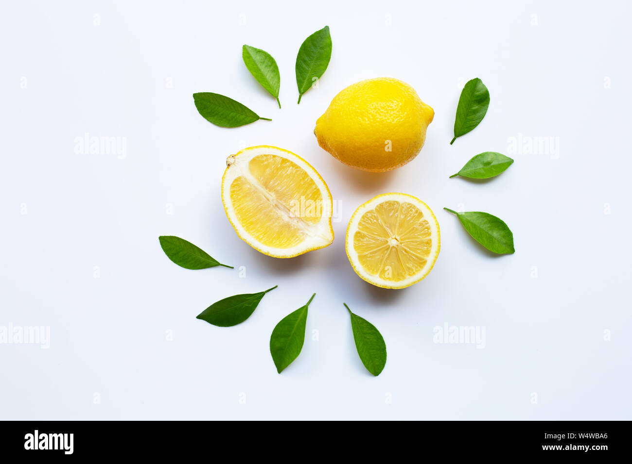 lemon and slices with leaves isolated on white background Stock Photo ...