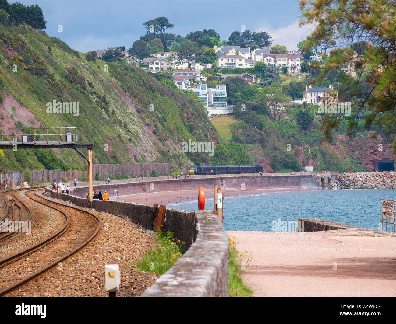 Main Line Railway along the coast at Teignmouth Devon Stock Photo - Alamy