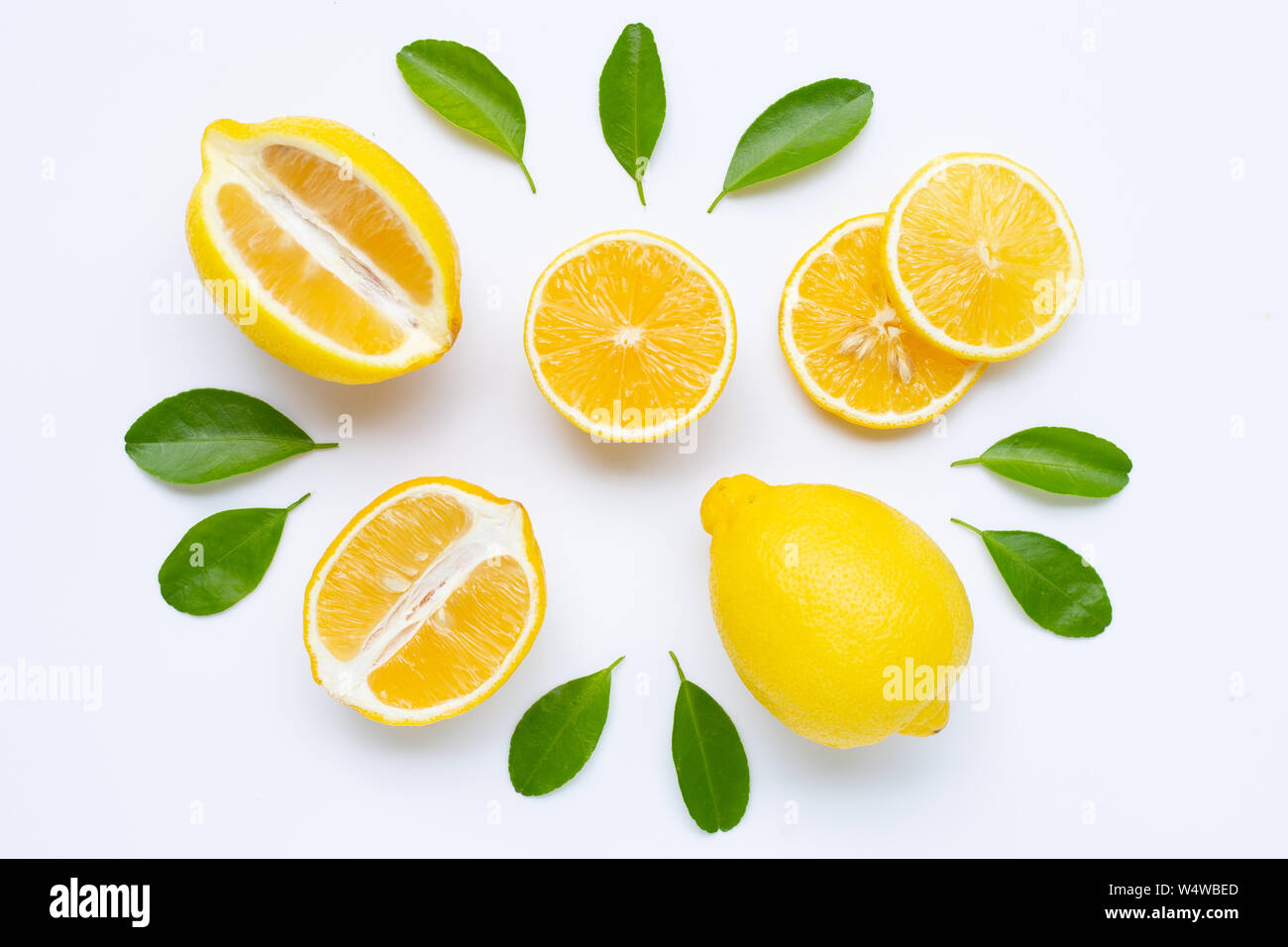 lemon and slices with leaves isolated on white background Stock Photo ...