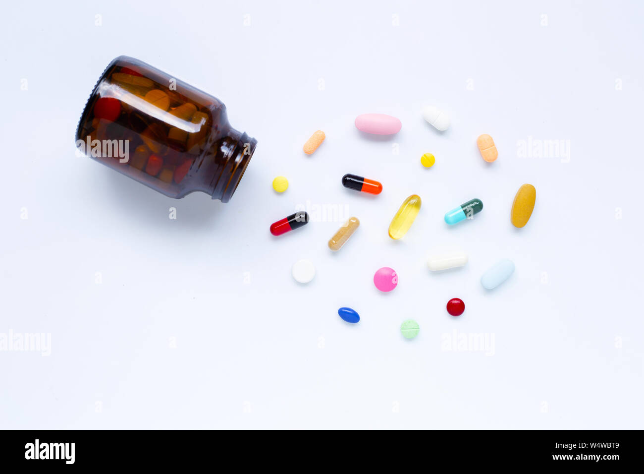 Colorful tablets with capsules and pills on white background Stock ...