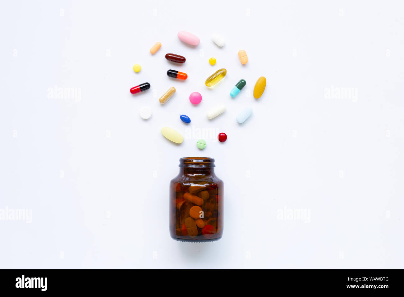 Colorful tablets with capsules and pills on white background Stock ...