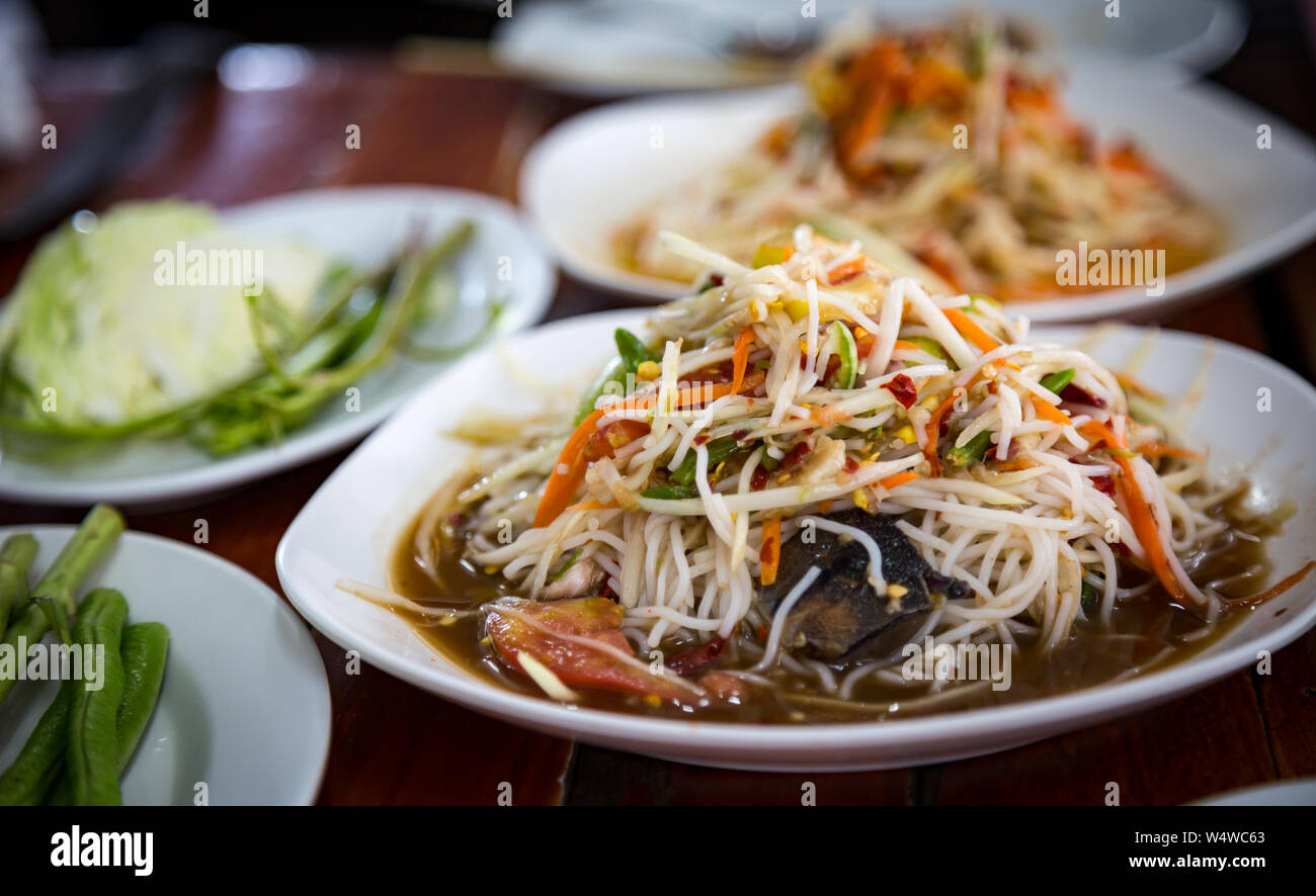 Northeastern style Spicy Papaya Salad and Vermicelli, Thai street food ...