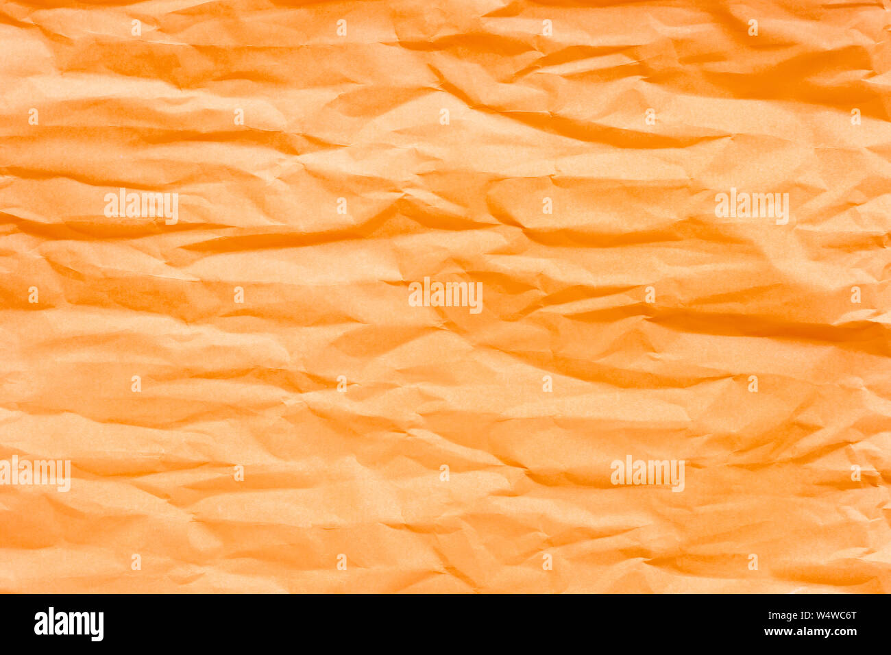 Brown orange crumpled paper for background Stock Photo - Alamy