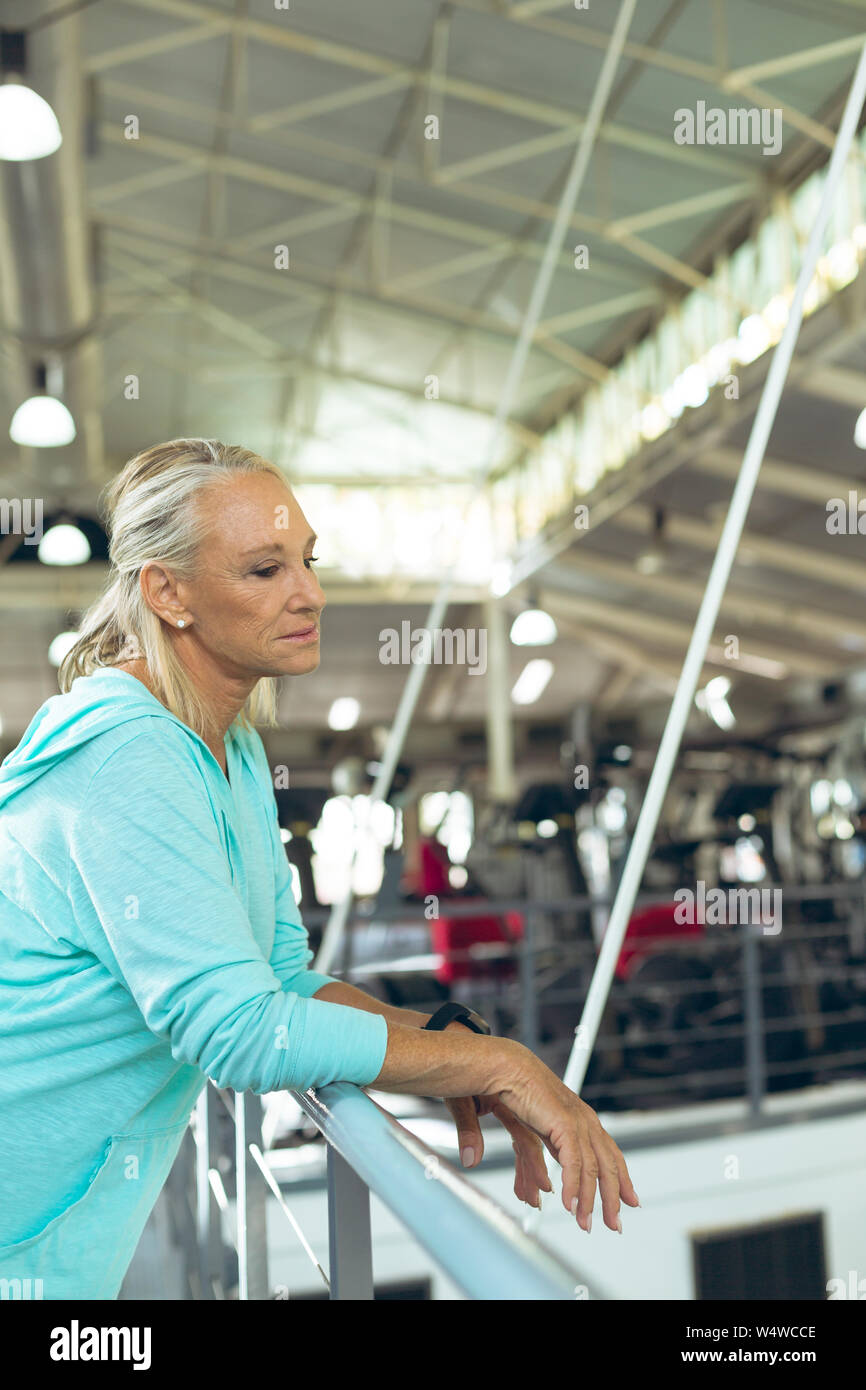 Women leaning on railing hi-res stock photography and images - Alamy
