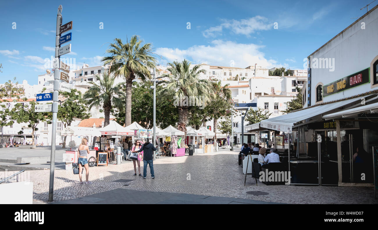 Albufeira, Portugal - May 3, 2018: Street atmosphere and souvenir shop ...