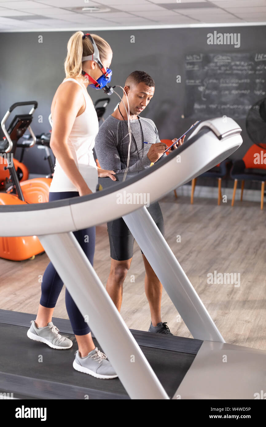 Woman doing a fitness test Stock Photo - Alamy