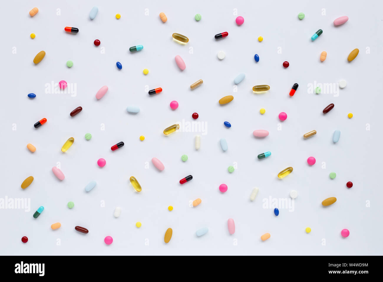 Colorful tablets with capsules and pills on white background Stock ...