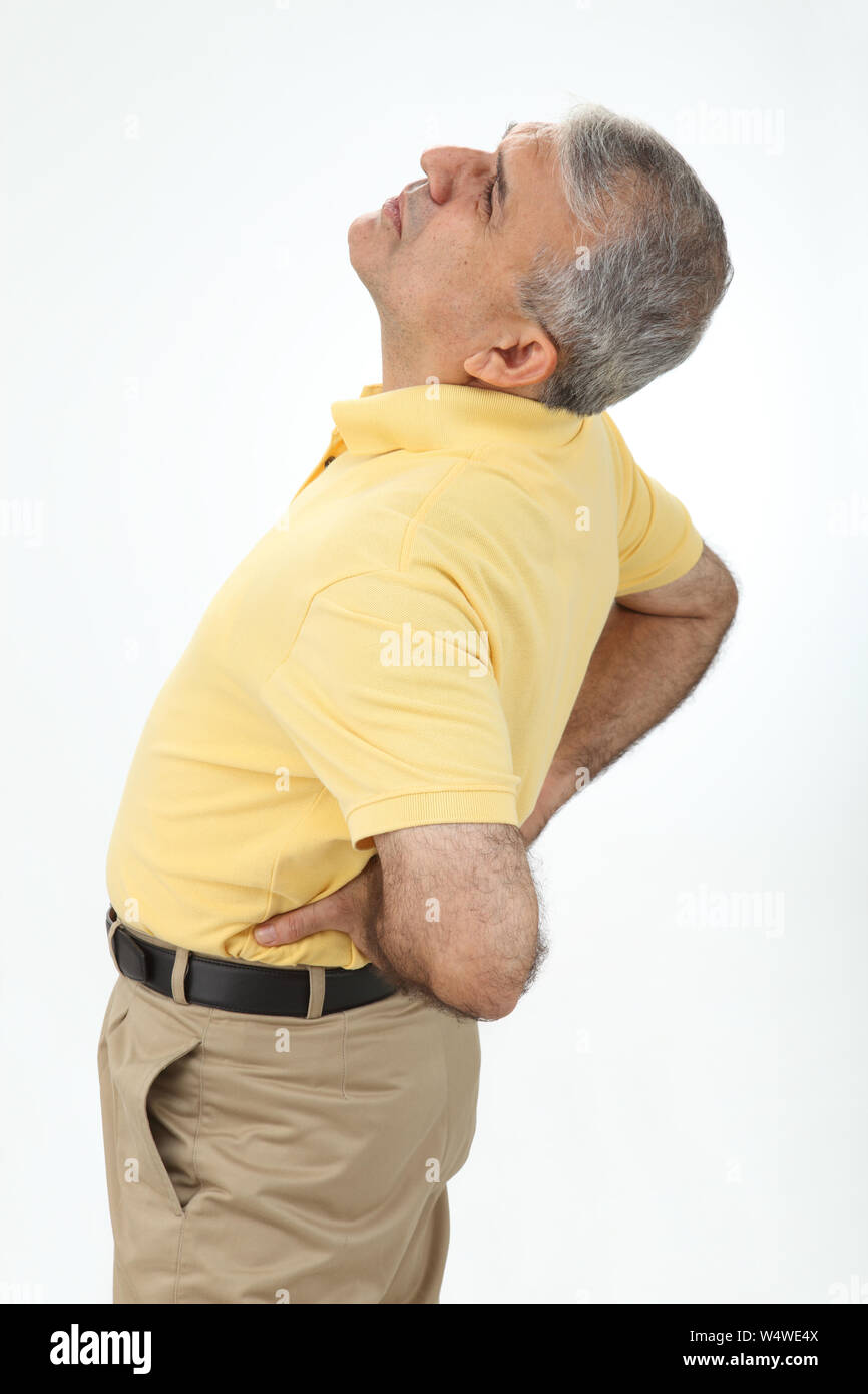 Indian old man suffering from lower back pain Stock Photo - Alamy