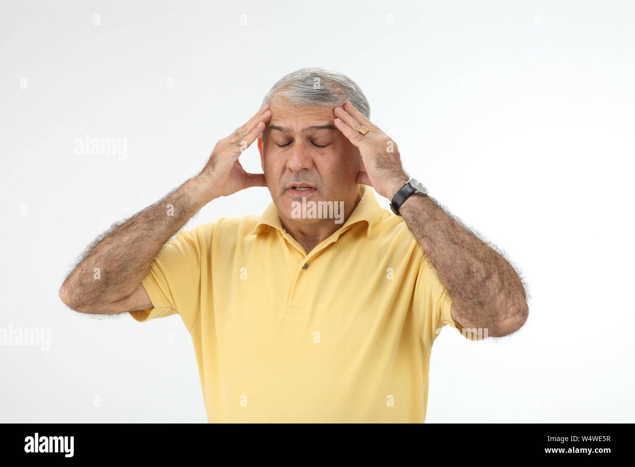 Man suffering from headache Stock Photo - Alamy