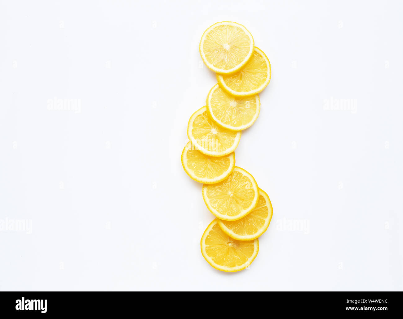 Fresh lemon slices on white background Stock Photo - Alamy