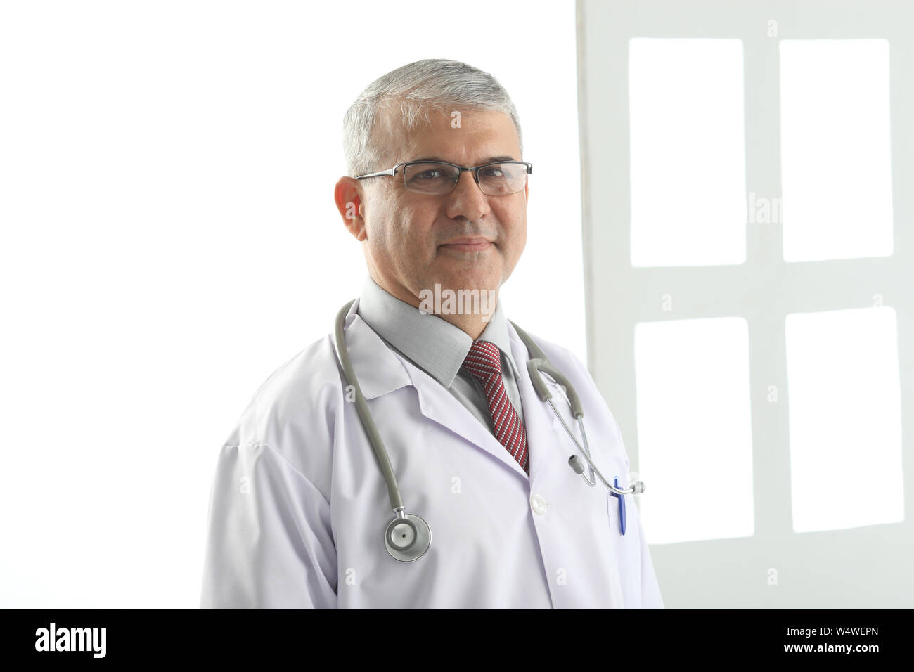 Portrait of a male doctor Stock Photo - Alamy