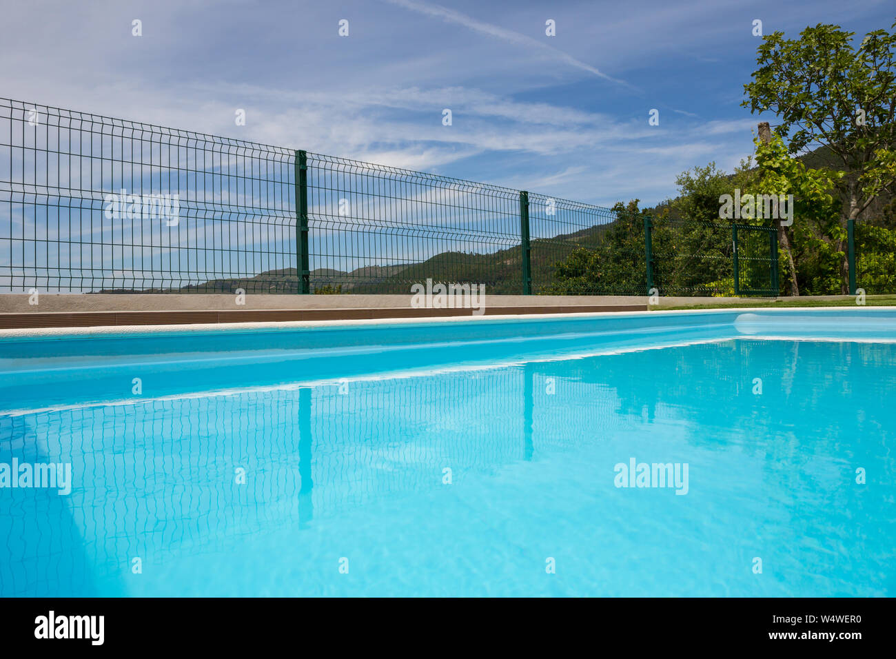 swimming pool with blue water Stock Photo - Alamy