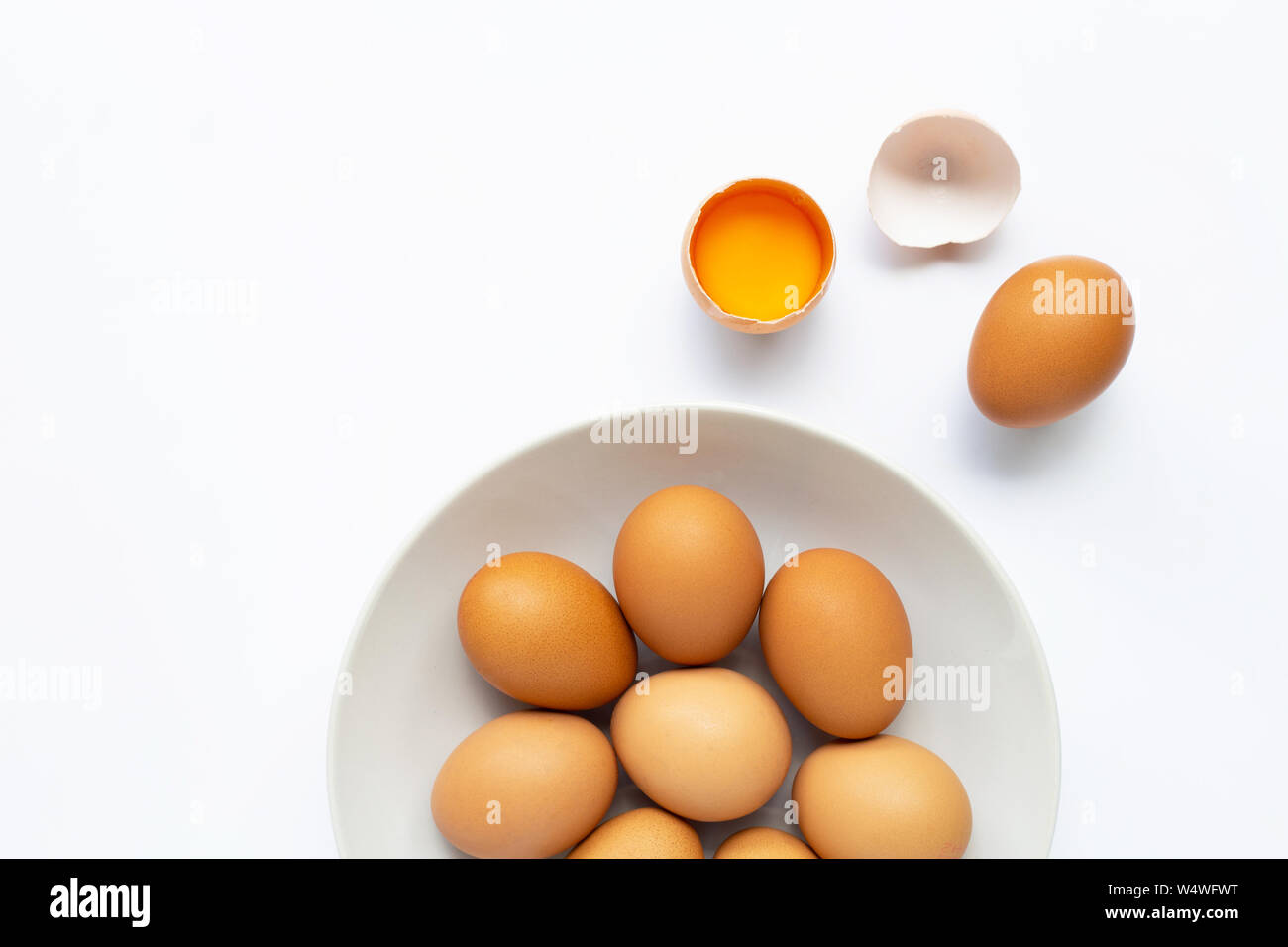 Eggs on white background. Top view Stock Photo - Alamy