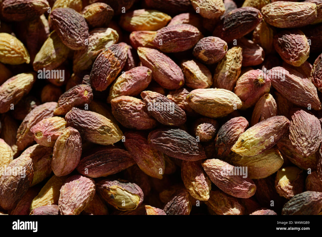 Pistachio nuts with and without shell hi-res stock photography and ...