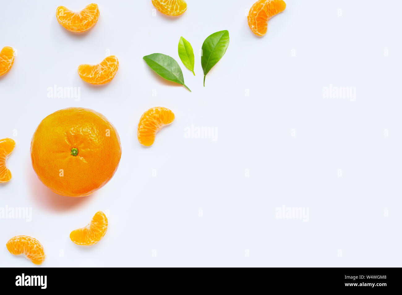Mandarin segments, Fresh orange isolated on white background. Copy ...