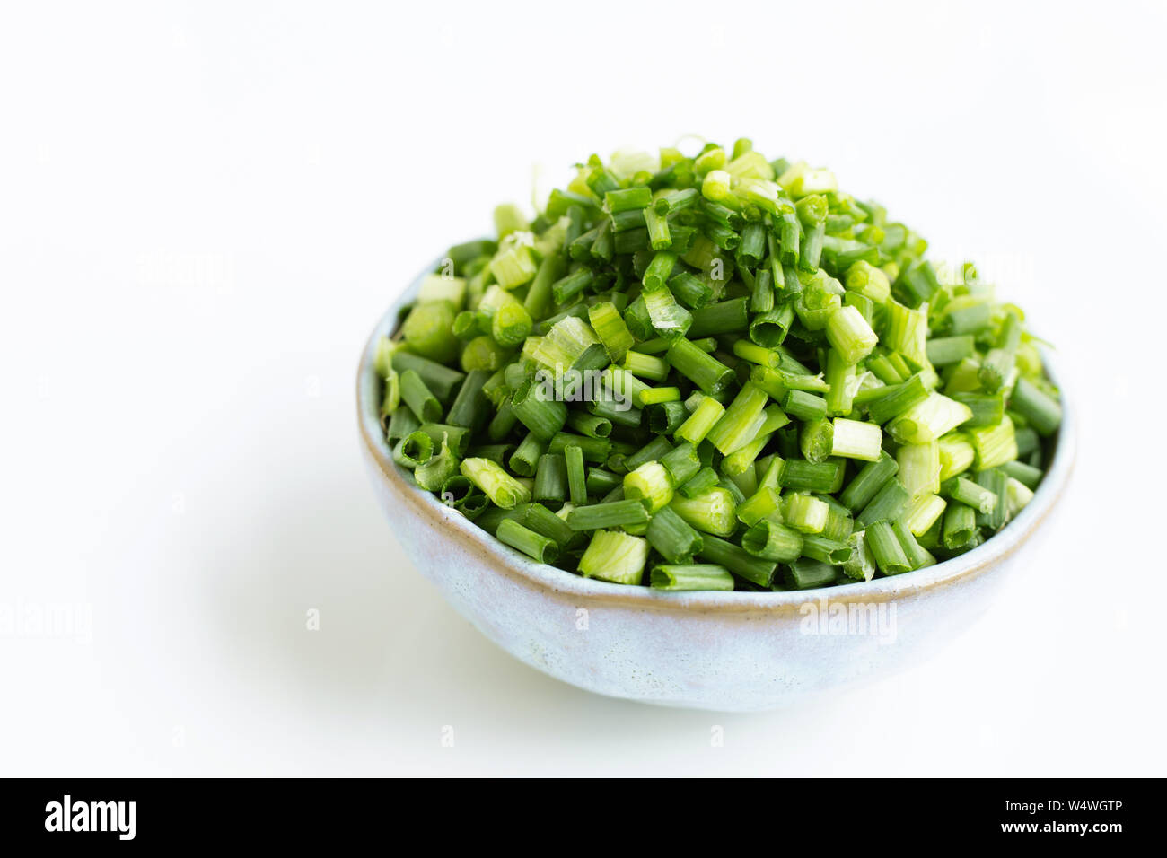 green onions isolated on white background Stock Photo - Alamy