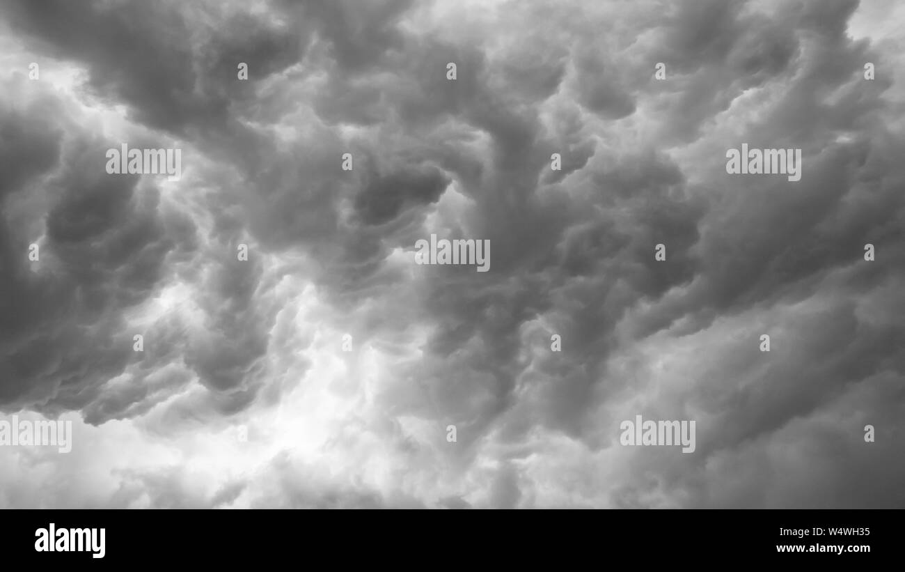 Dark ominous grey storm clouds. Dramatic sky Stock Photo - Alamy