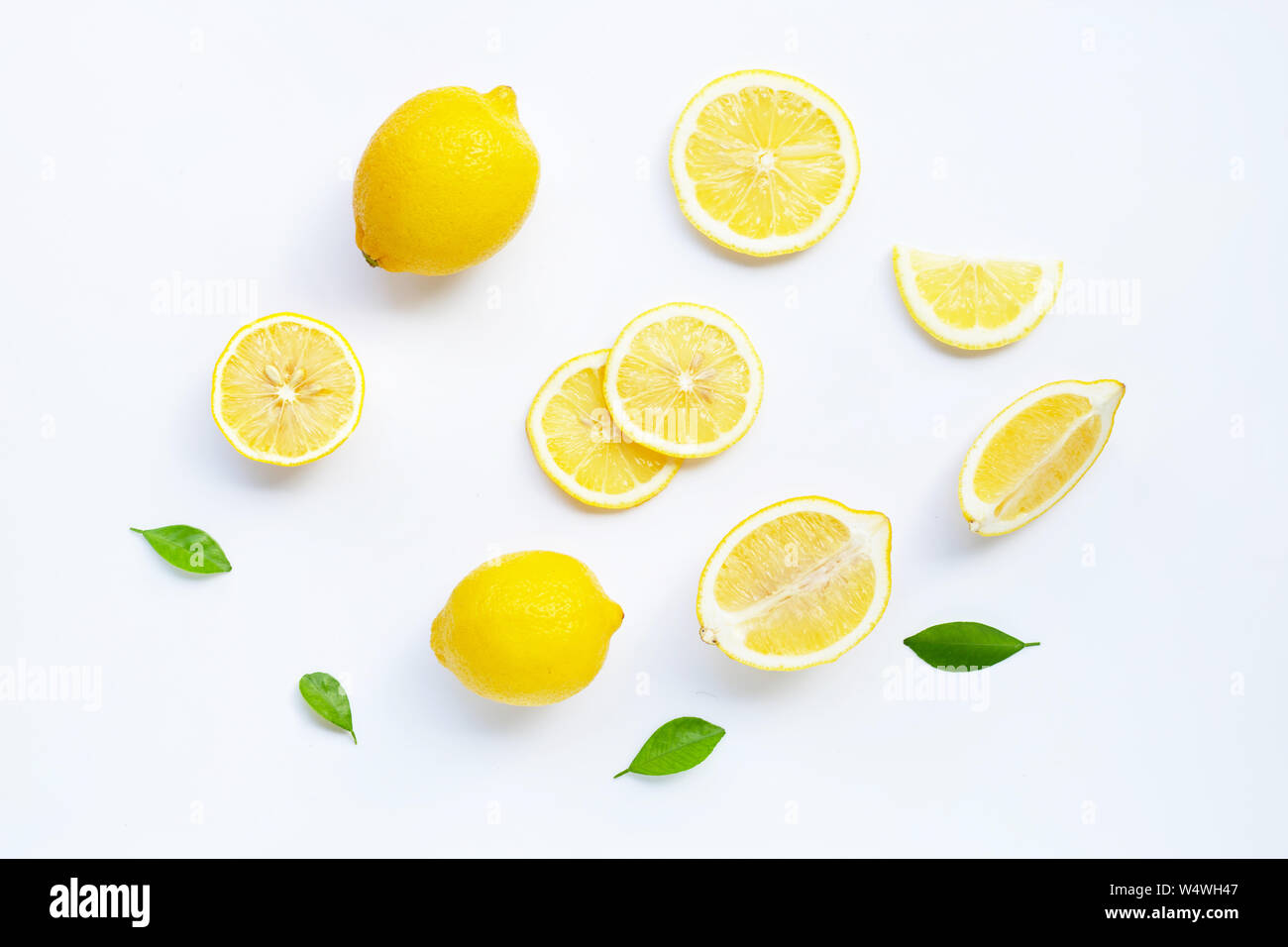 lemon and slices with leaves isolated on white background Stock Photo ...