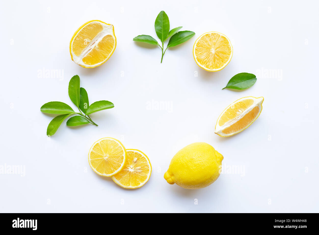 lemon and slices with leaves isolated on white background Stock Photo ...