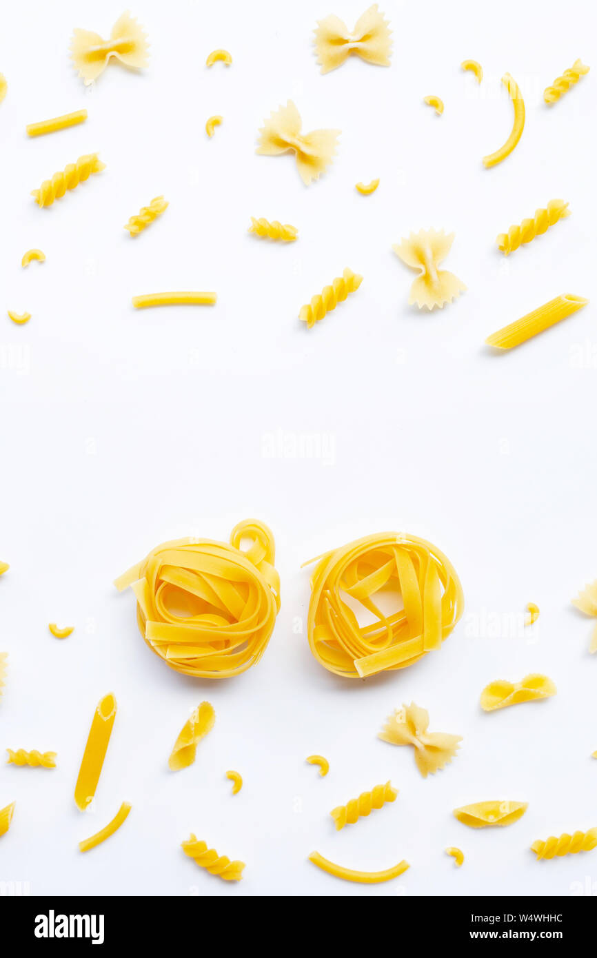 Different types of dry pasta on white background Stock Photo - Alamy