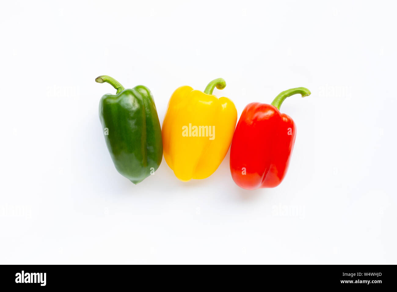 Green, yellow and red fresh bell pepper on white Stock Photo - Alamy