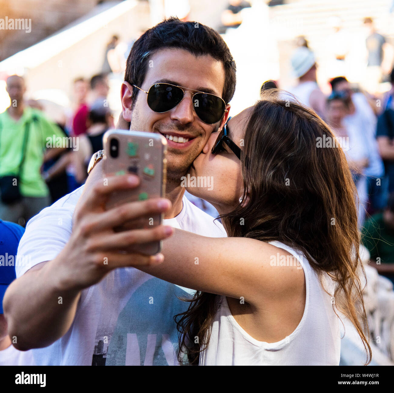 Couple in love take a selfie photograph together in front of the ...