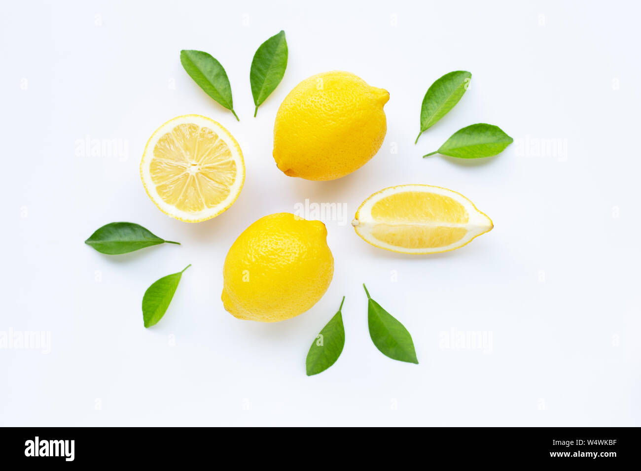 lemon and slices with leaves isolated on white background Stock Photo ...