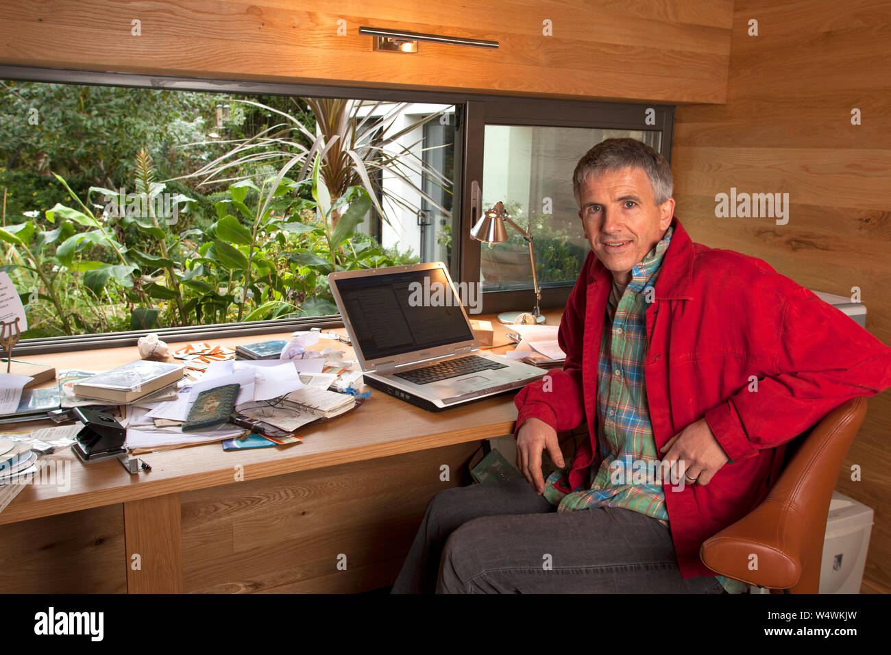 Patrick Gale in his writing room overlooking the garden at Trevilley ...