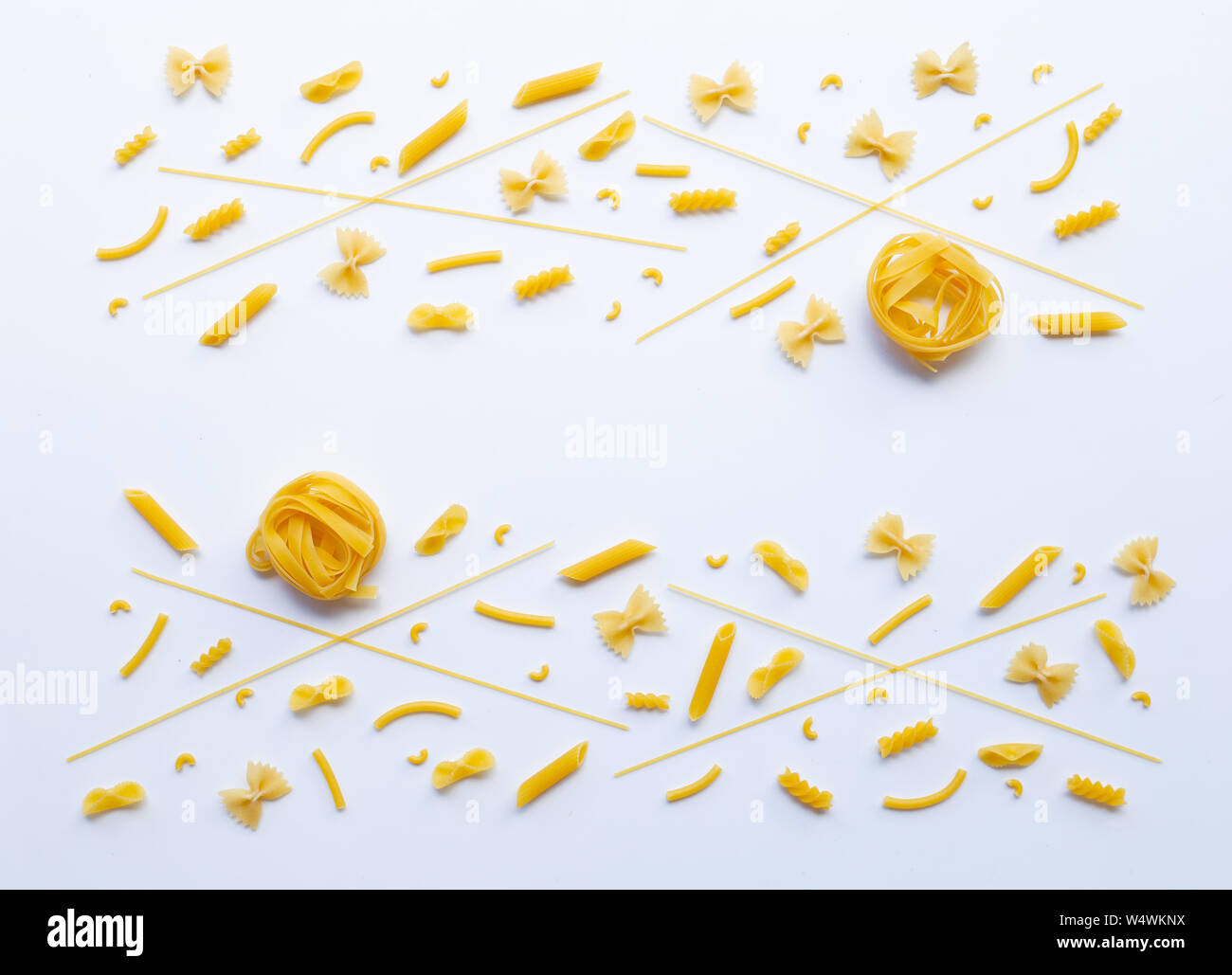Different types of dry pasta on white background Stock Photo - Alamy