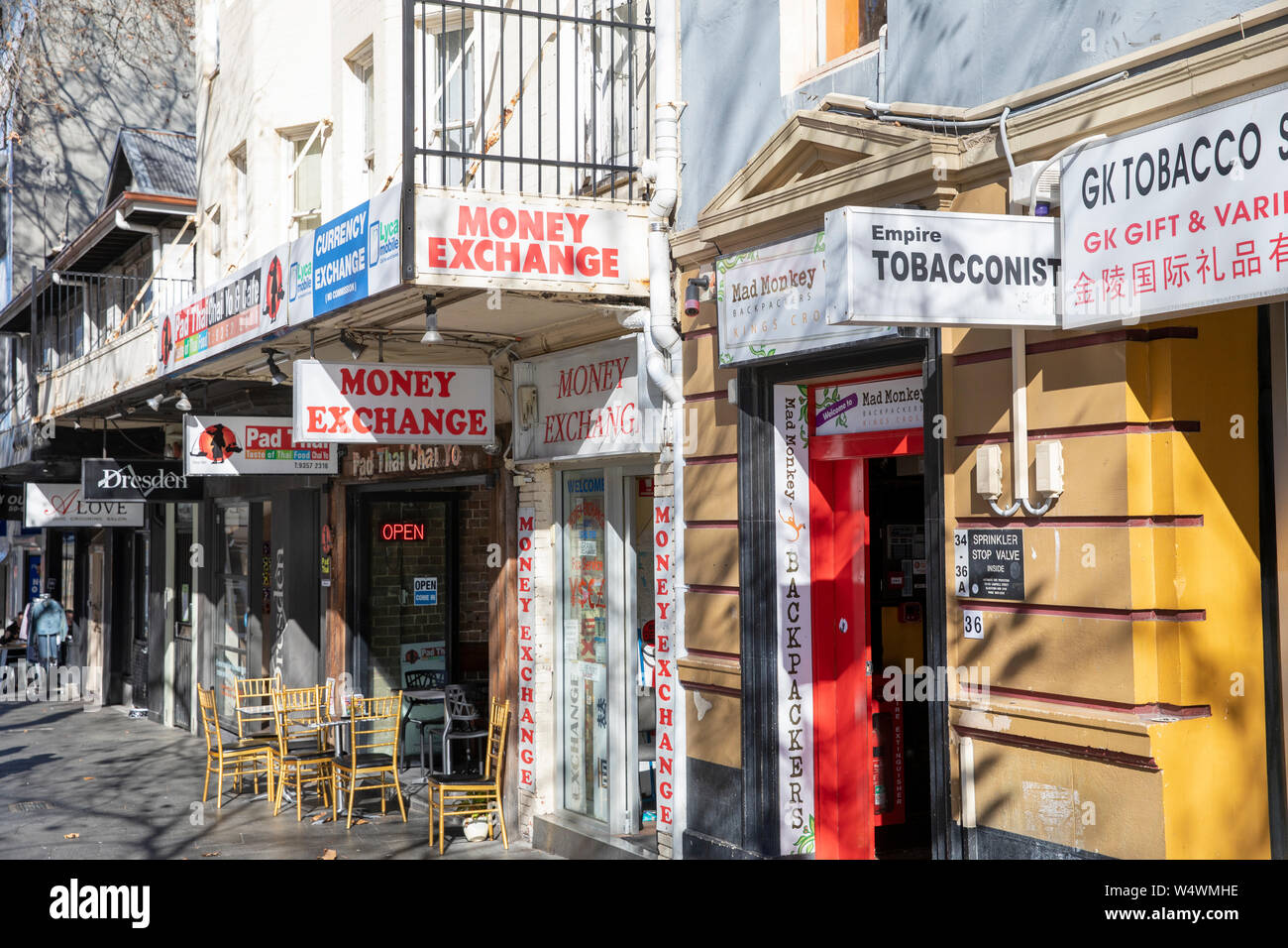 Kings Cross Sydney, strip of tired and run down shops including money ...