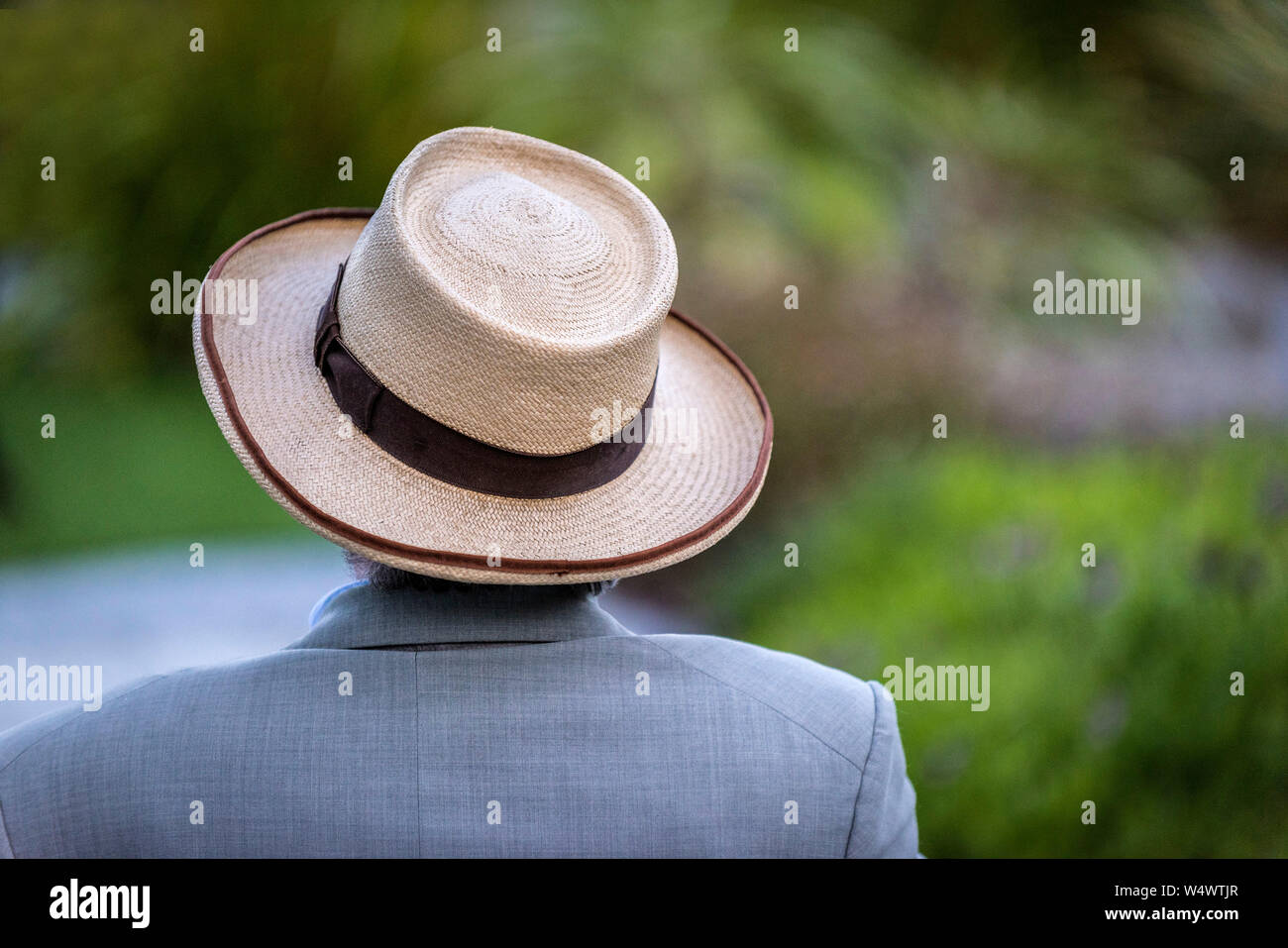 Wearing hat for protection hi-res stock photography and images - Alamy