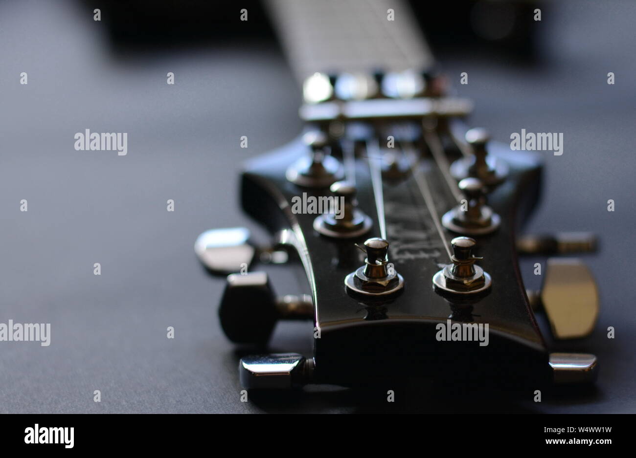six-stringed electric guitar isolated on white Stock Photo - Alamy