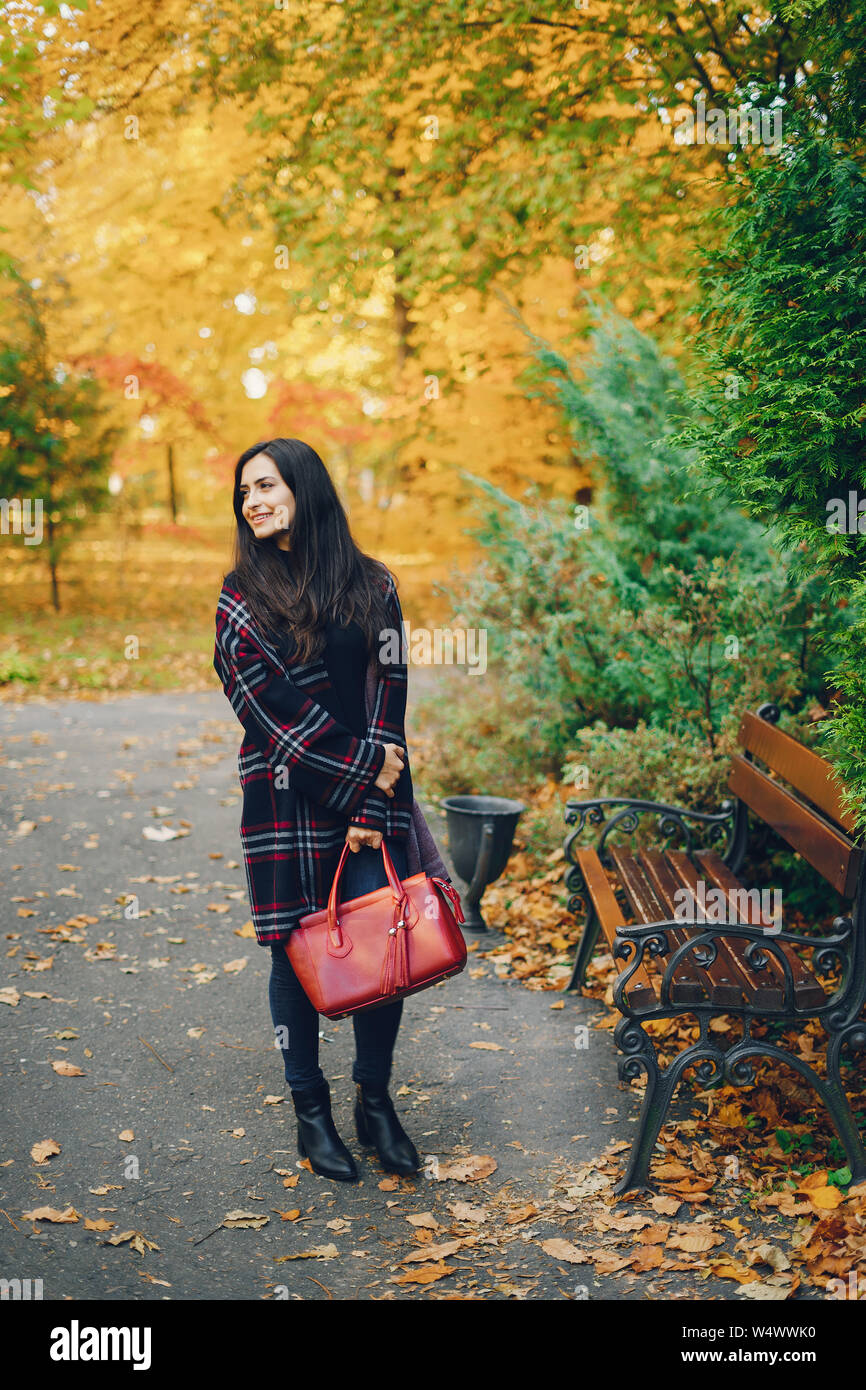Stylish walking through city park hi-res stock photography and images ...